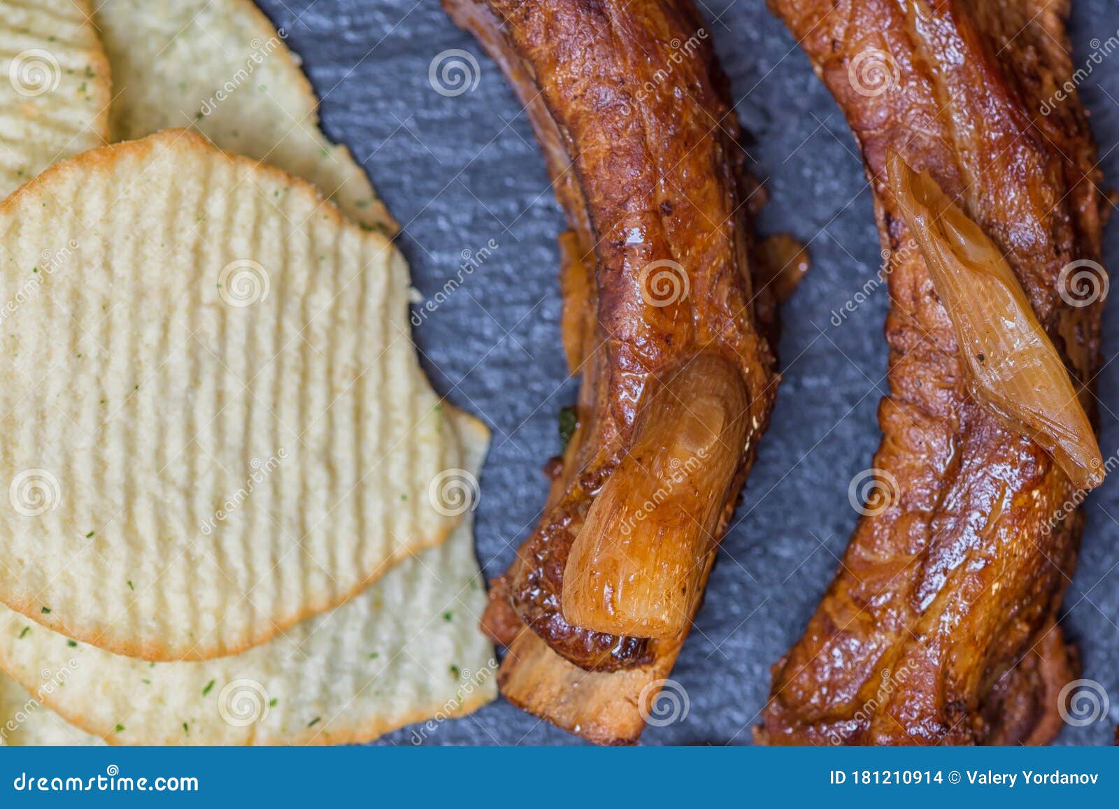 Ribs Chips Black Plate Closeup Stock Photo - Image of recipe, black ...