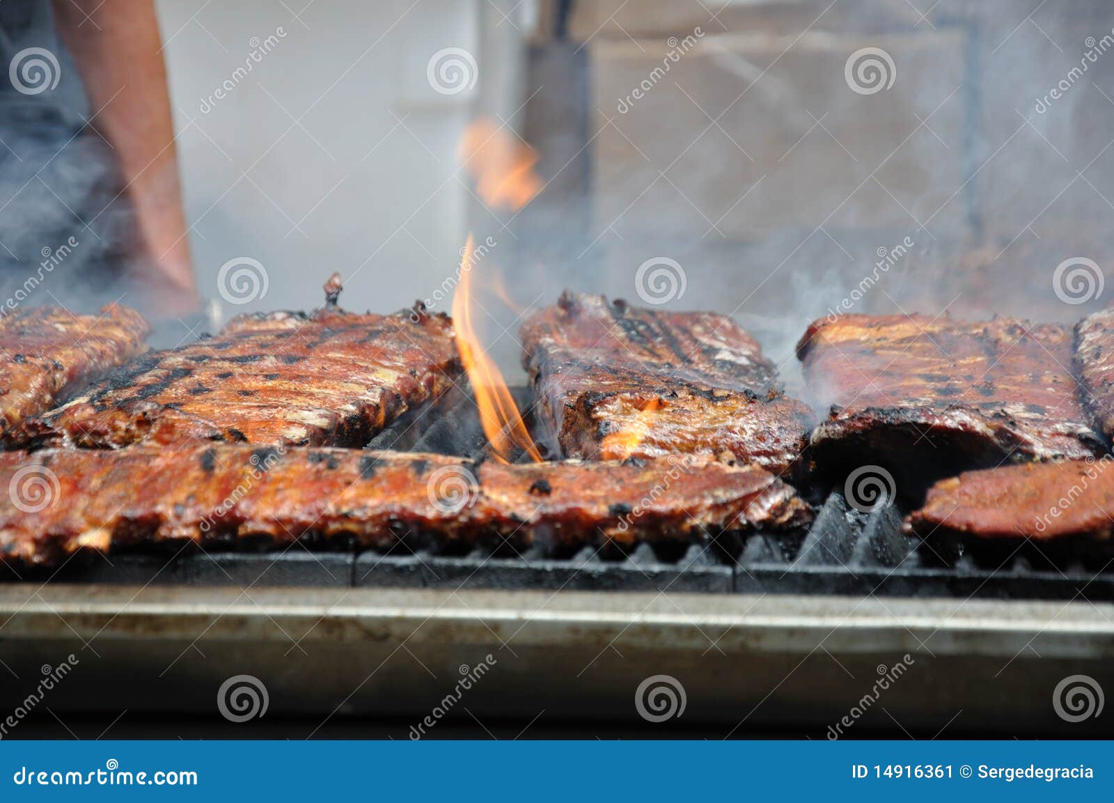 Ribs on the grill stock image. Image of chared, fire - 14916361