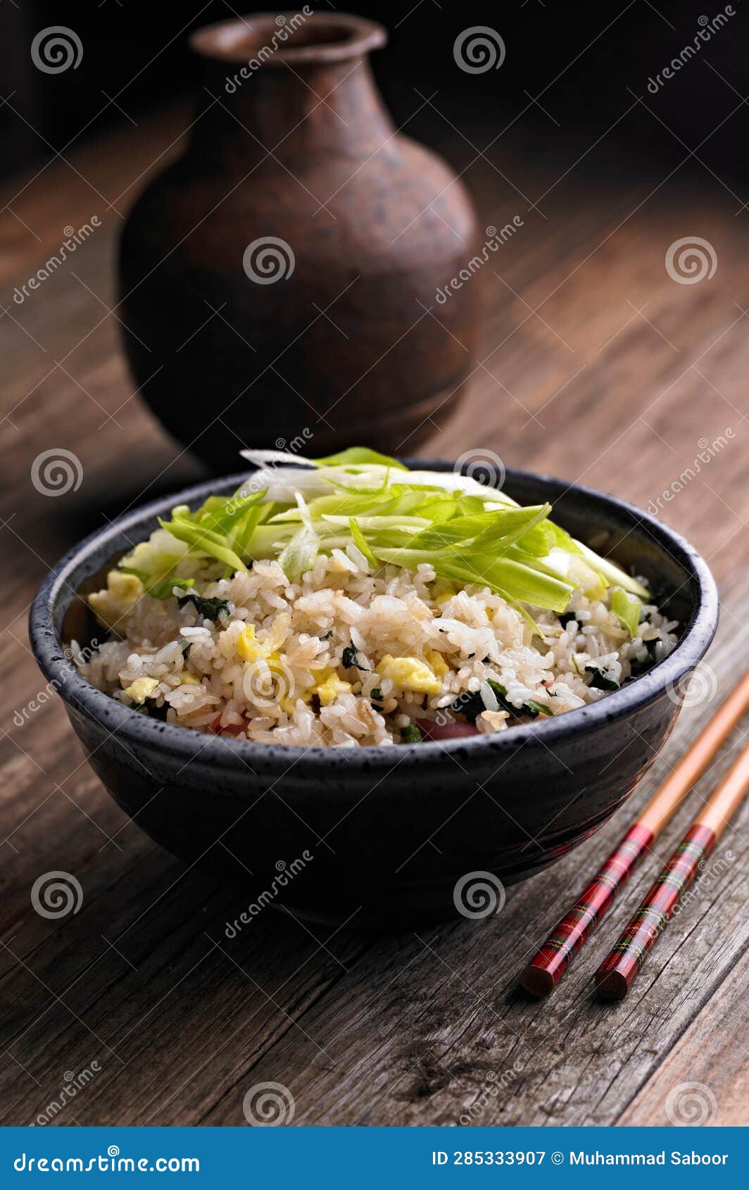 Satisfying Comfort: Close-Up of Chicken Fried Rice with Fresh ...