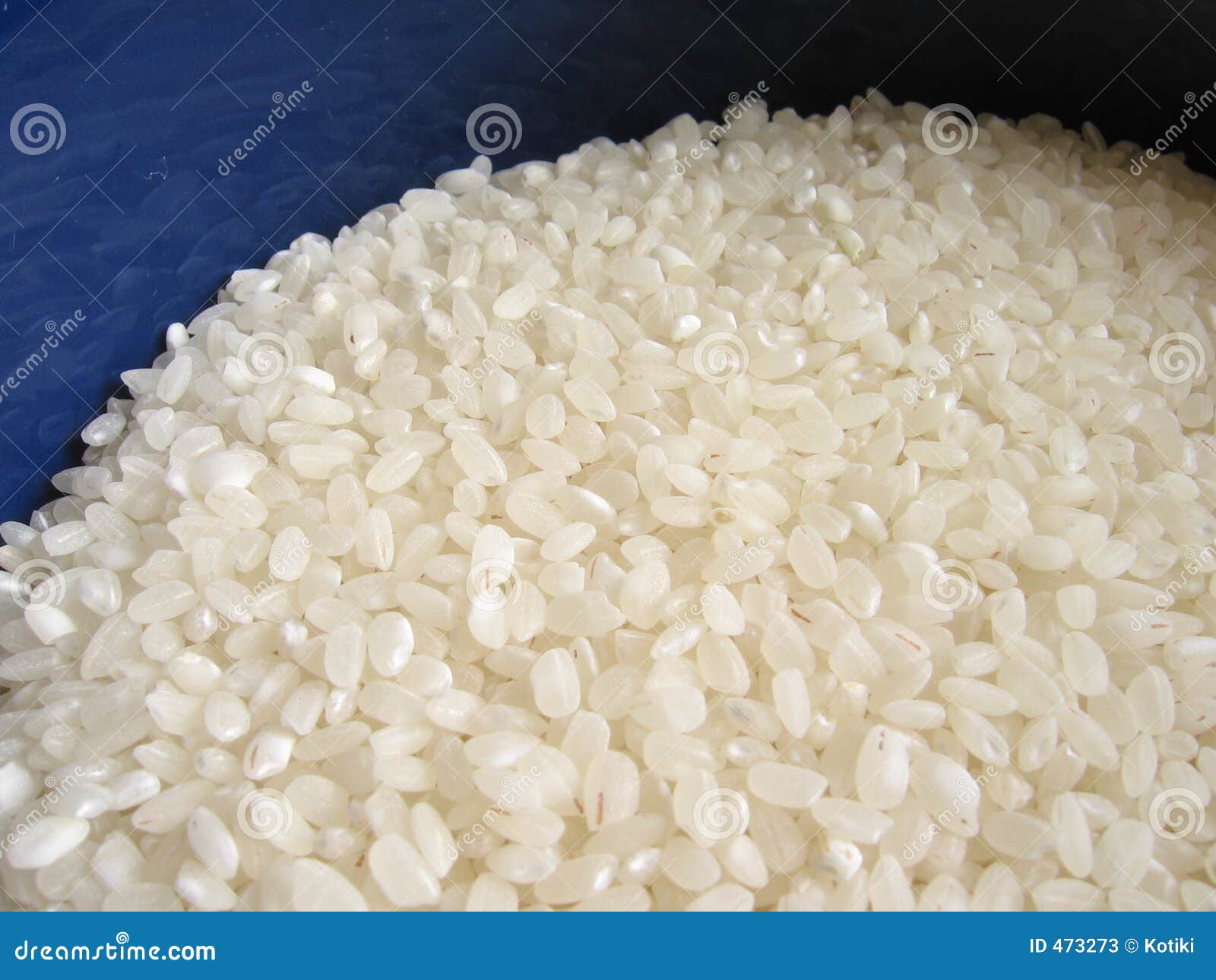 Rice in blue bowl stock image. Image of seed, cooking, dish - 473273