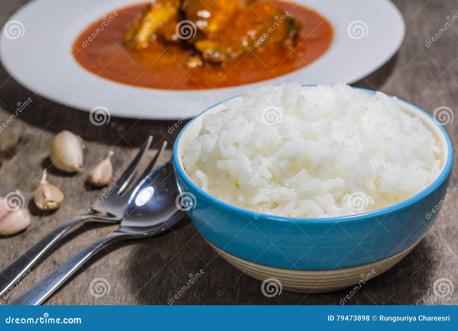 Rice in a bowl on table stock photo. Image of traditional - 79473898