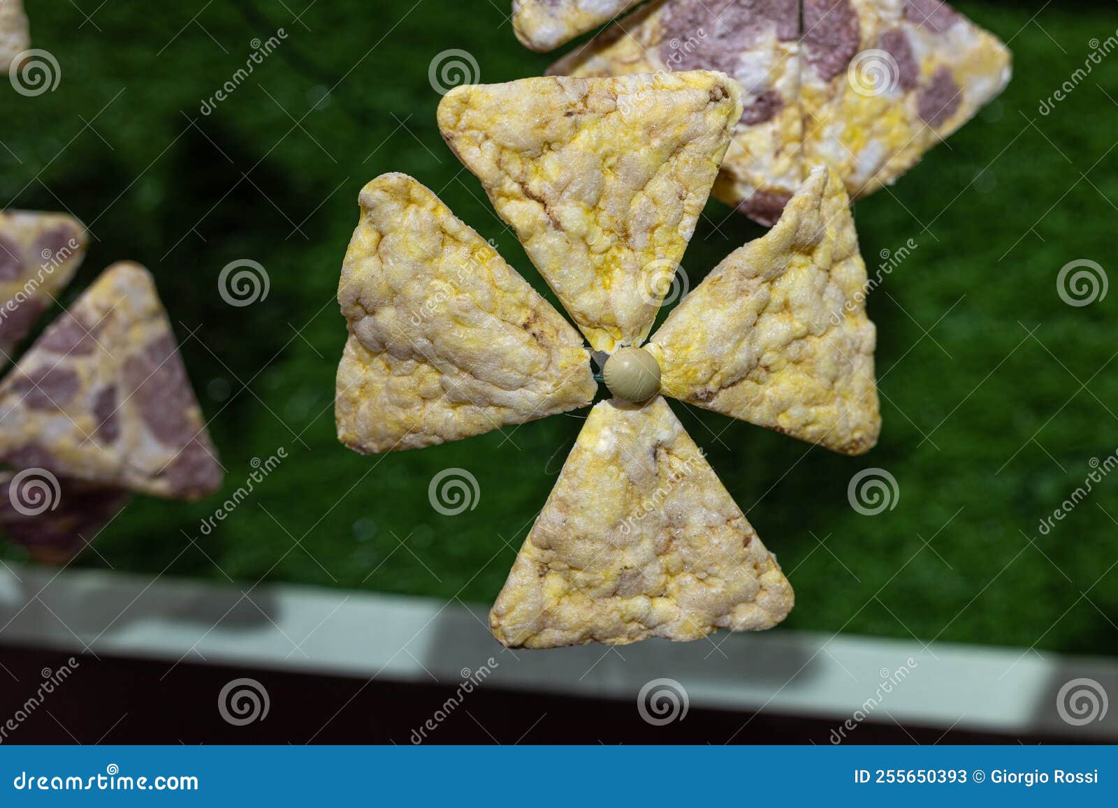Rice and Cheese Appetizers in a Triangular Shape Arranged To Create a ...