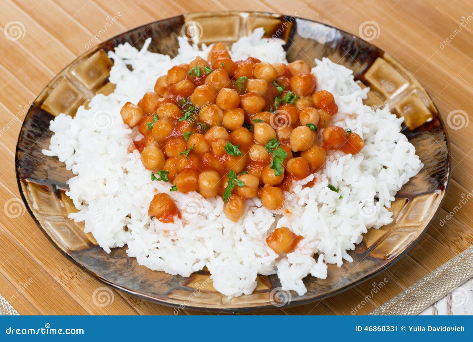 Rice with Chickpeas in Tomato Sauce on a Plate Stock Image - Image of ...