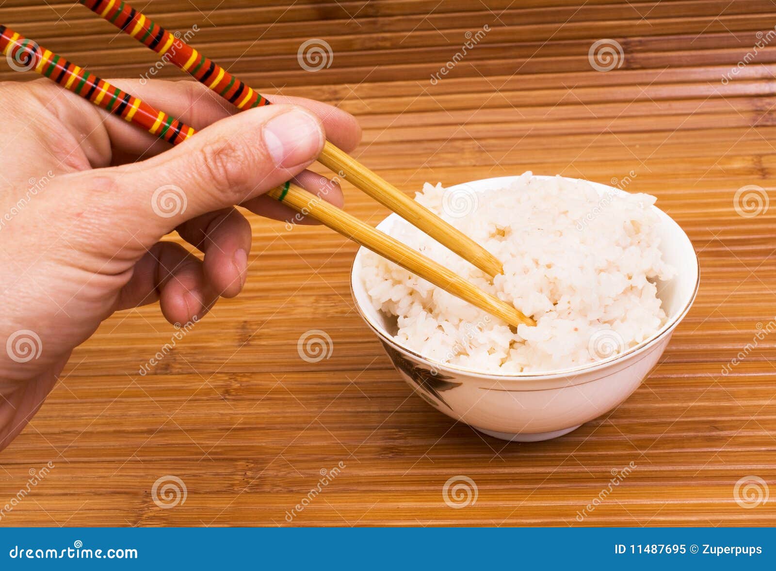 Rice and chopsticks stock image. Image of bamboo, background - 11487695