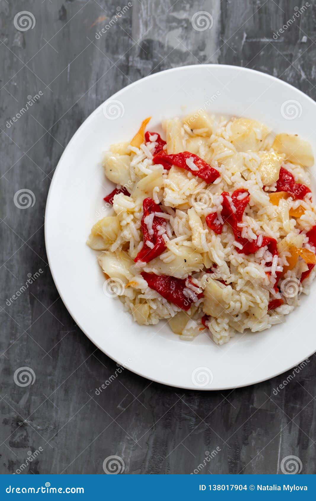 Rice with Cod Fish and Red Pepper on White Dish Stock Photo - Image of ...