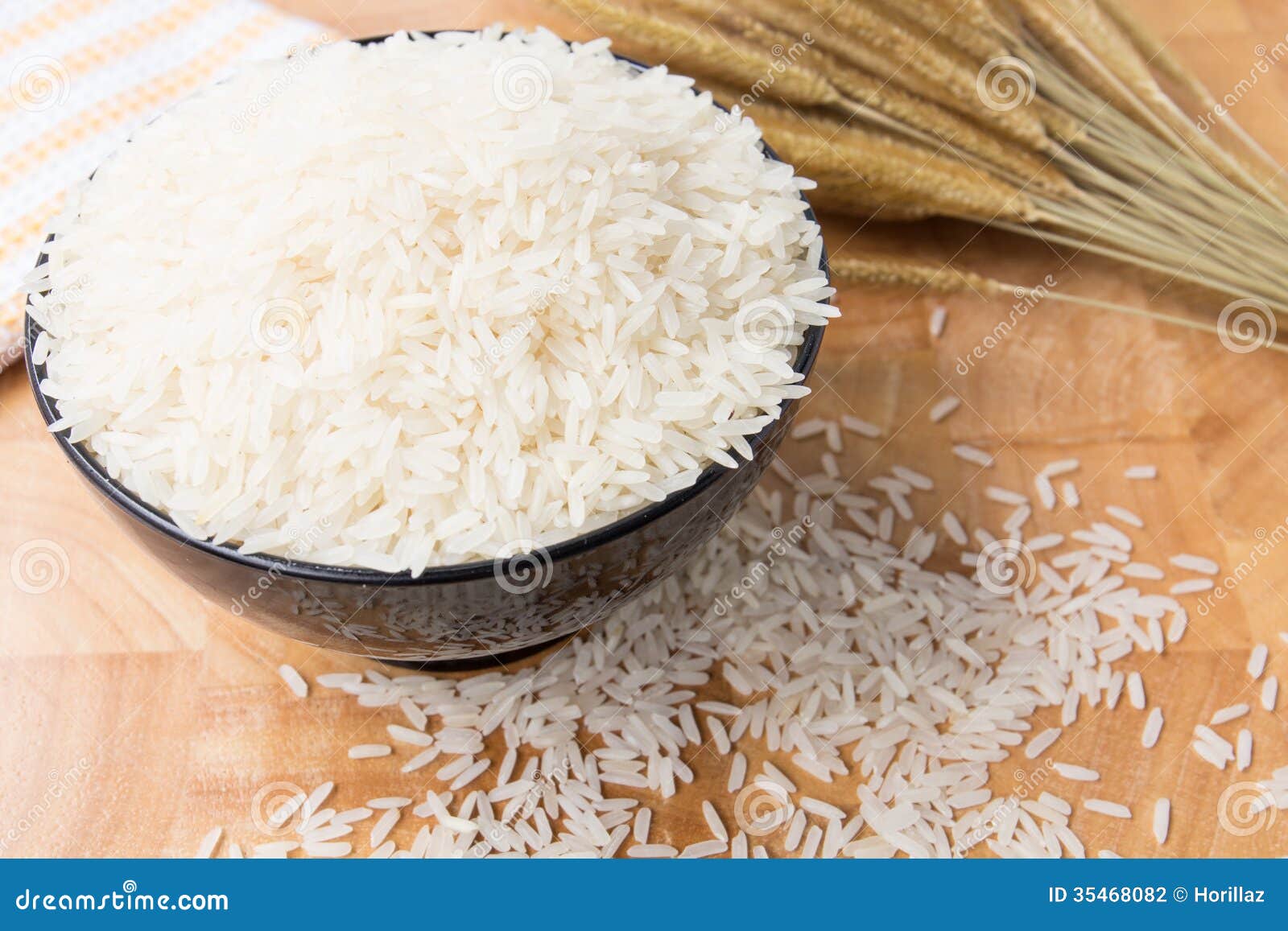 Rice in the cup stock photo. Image of wooden, crop, scoop - 35468082