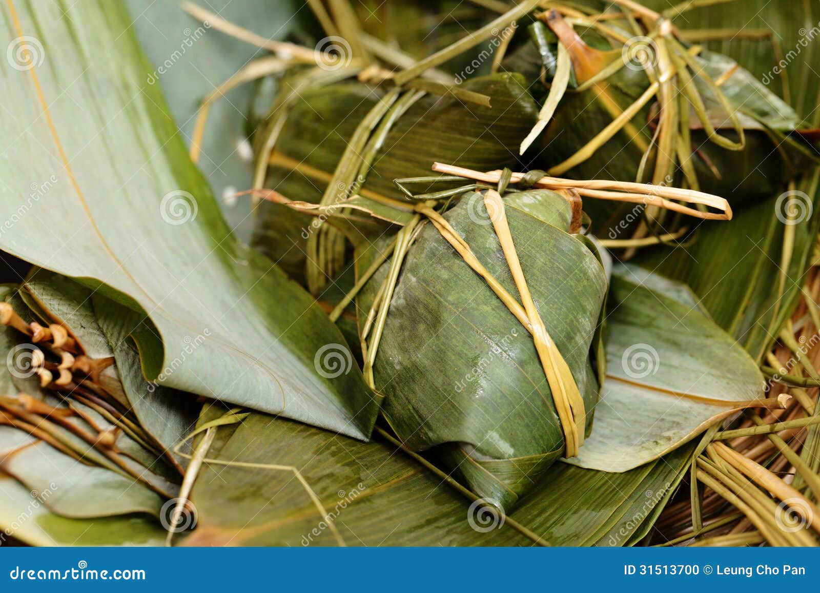 Rice Dumpling on Bamboo Leaves Stock Photo - Image of traditional ...