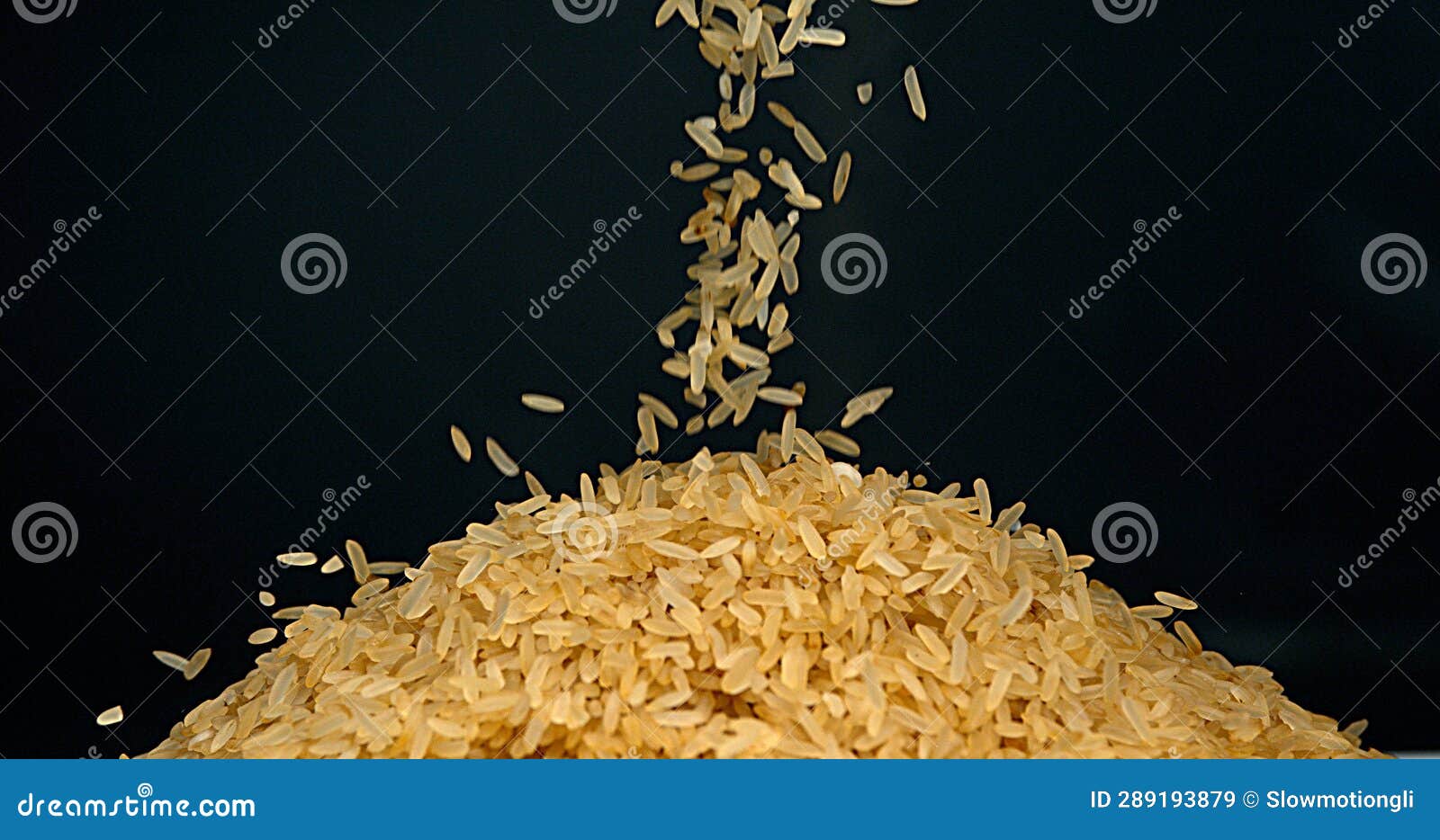 Rice Falling Against Black Background Stock Image - Image of ...