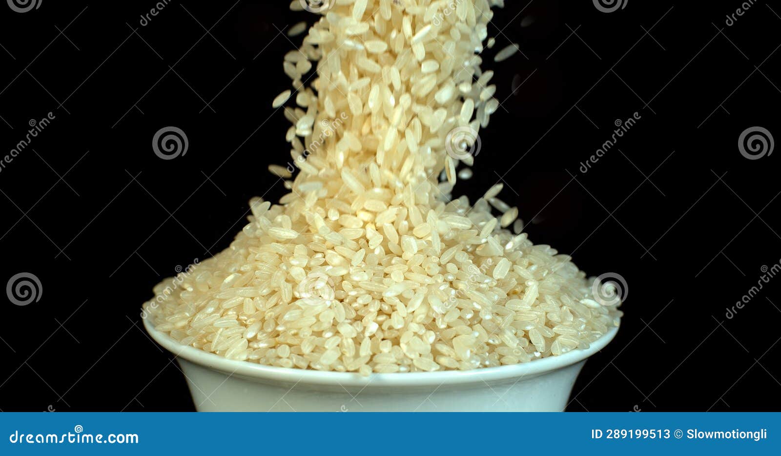 Rice Falling Against Black Background Stock Image - Image of diet ...