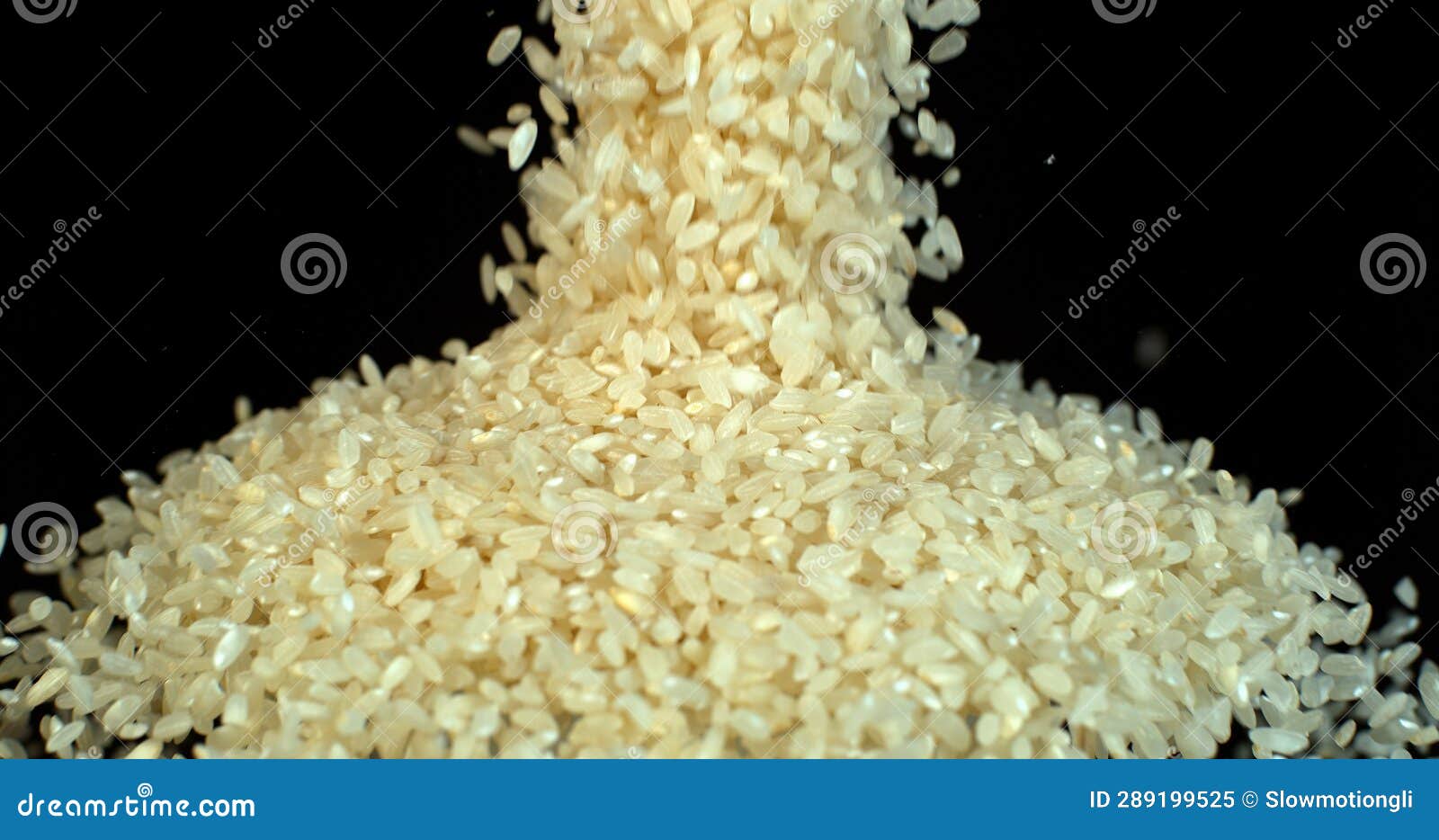 Rice Falling Against Black Background Stock Image - Image of grain ...