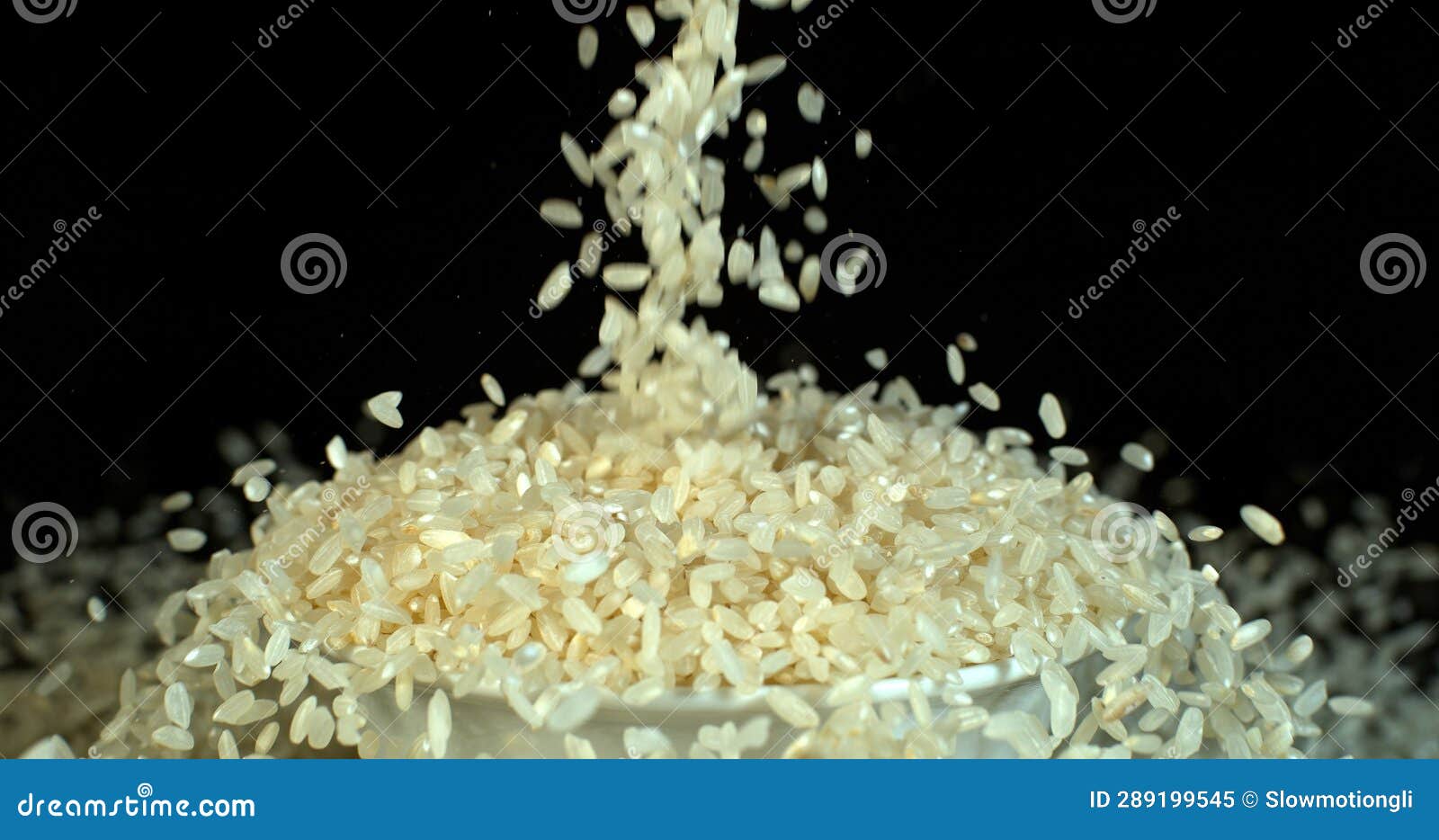Rice Falling Against Black Background Stock Image - Image of indoors ...