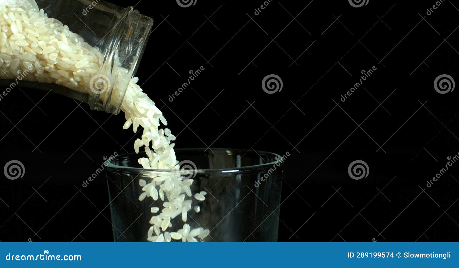 Rice Falling Against Black Background Stock Photo - Image of action ...