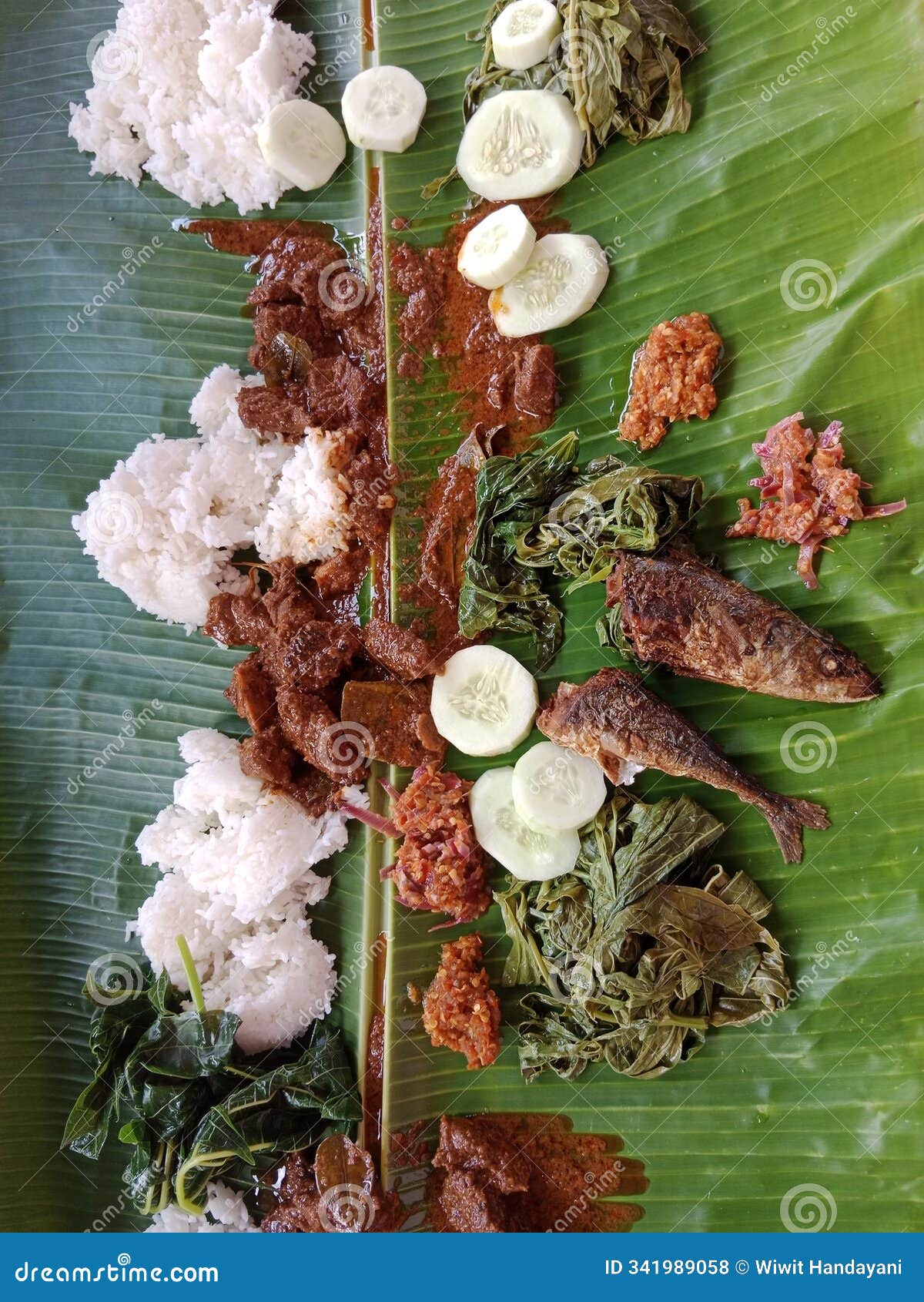 Rice, Fish, Cow Meat on Bananas Leaf Stock Photo - Image of leaf, meat ...