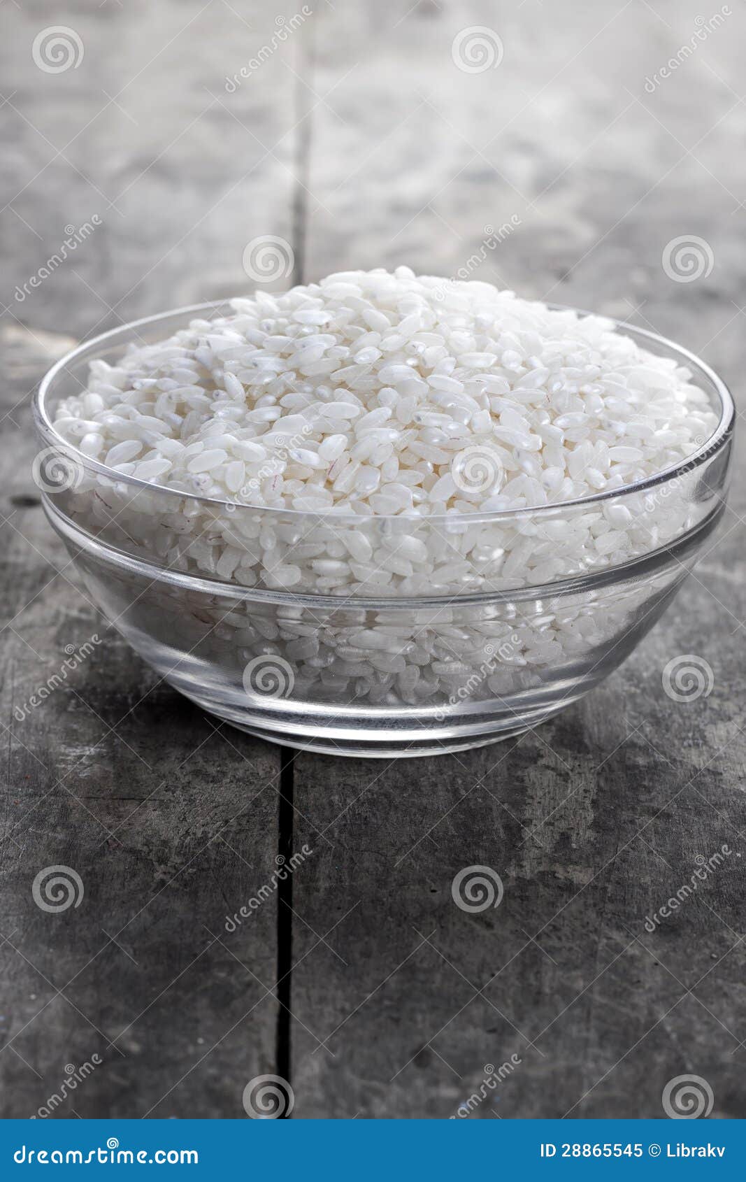 Rice in a glass bowl stock image. Image of wooden, color - 28865545