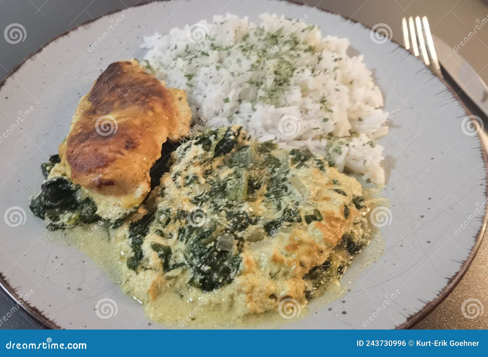 Rice with Gratinated Chicken with Spinach Stock Photo - Image of ...