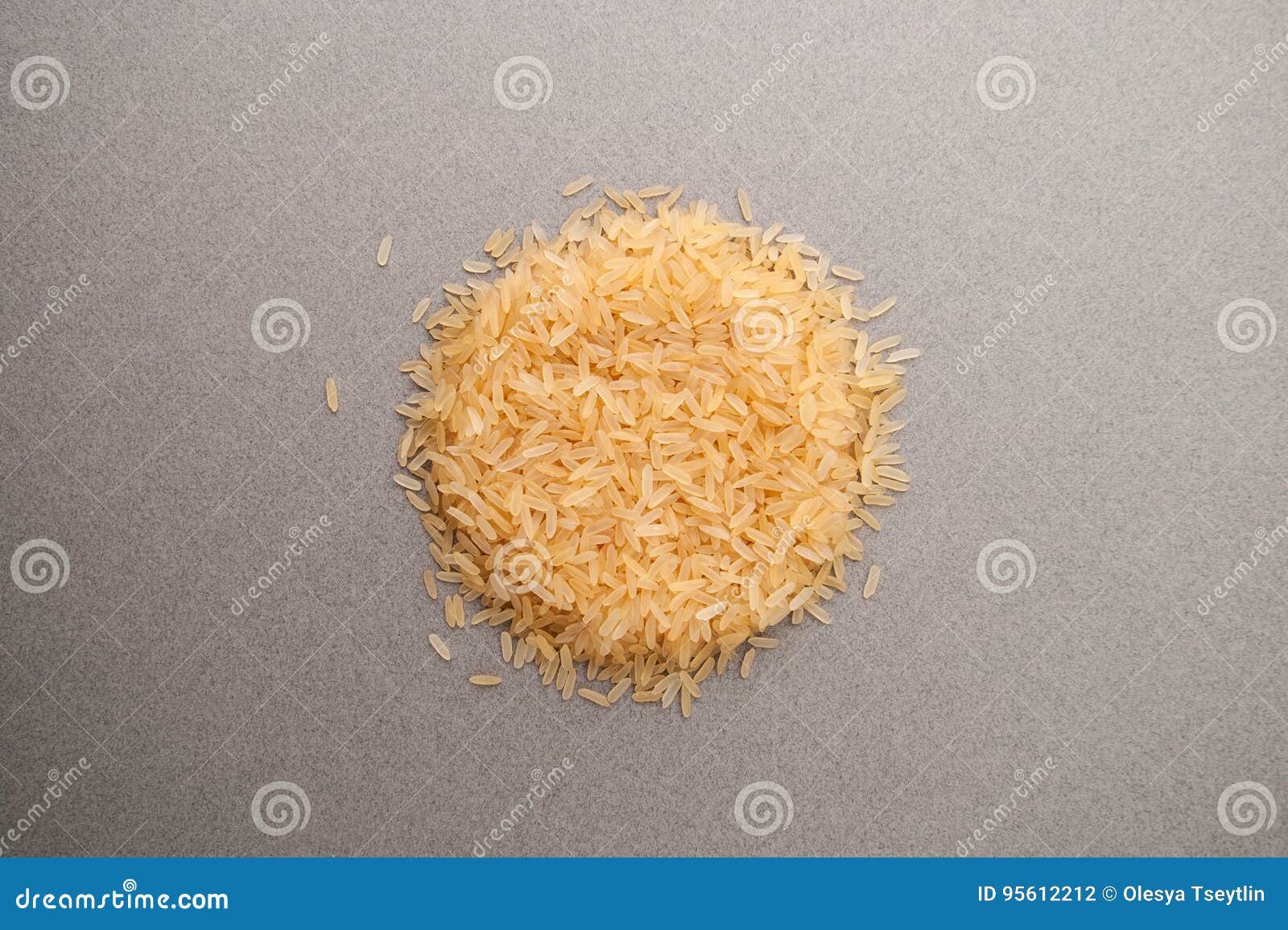 Rice Groats Lie All Around on a Light Gray Stone Table. Stock Photo ...