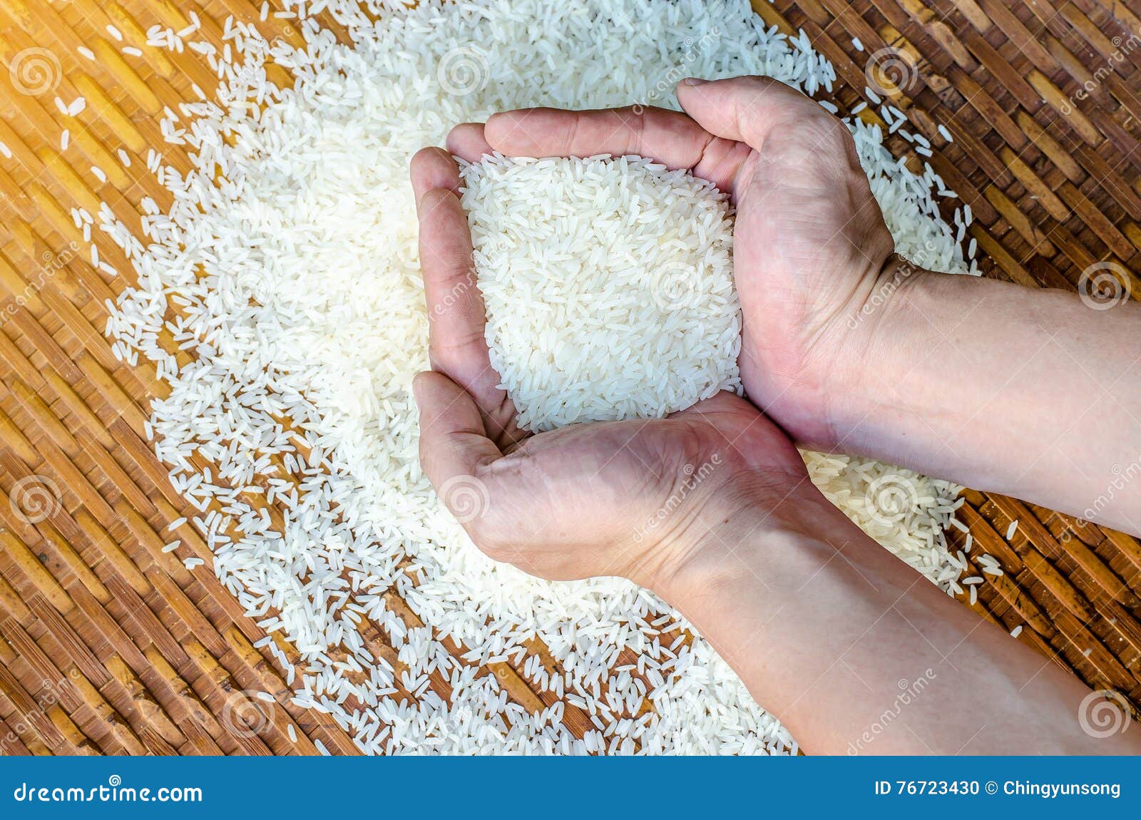 Rice in Hand. Plenty of Rice in Hand. Stock Photo - Image of finger ...