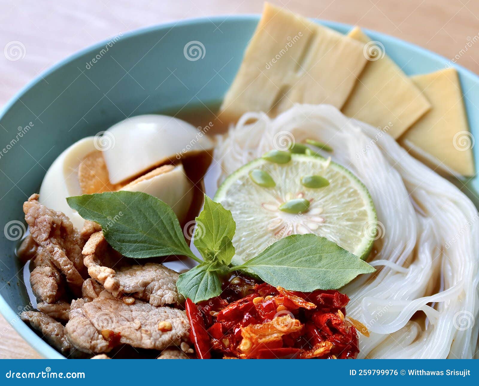Rice Noodles in Fish Curry with Egg and Pork Stock Photo - Image of ...