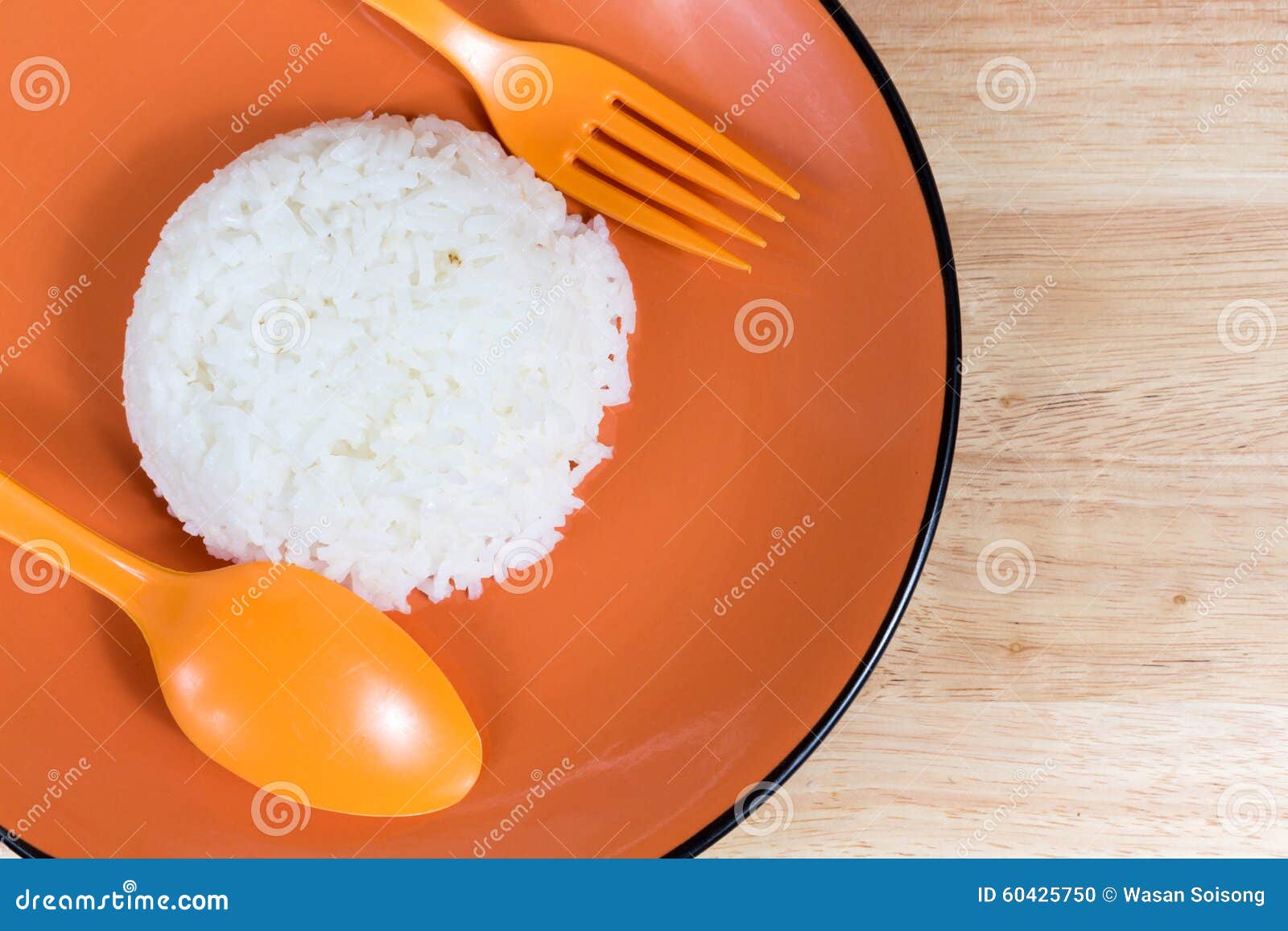 Rice on Orange Dish with Spoon on Wood Table Stock Photo - Image of ...