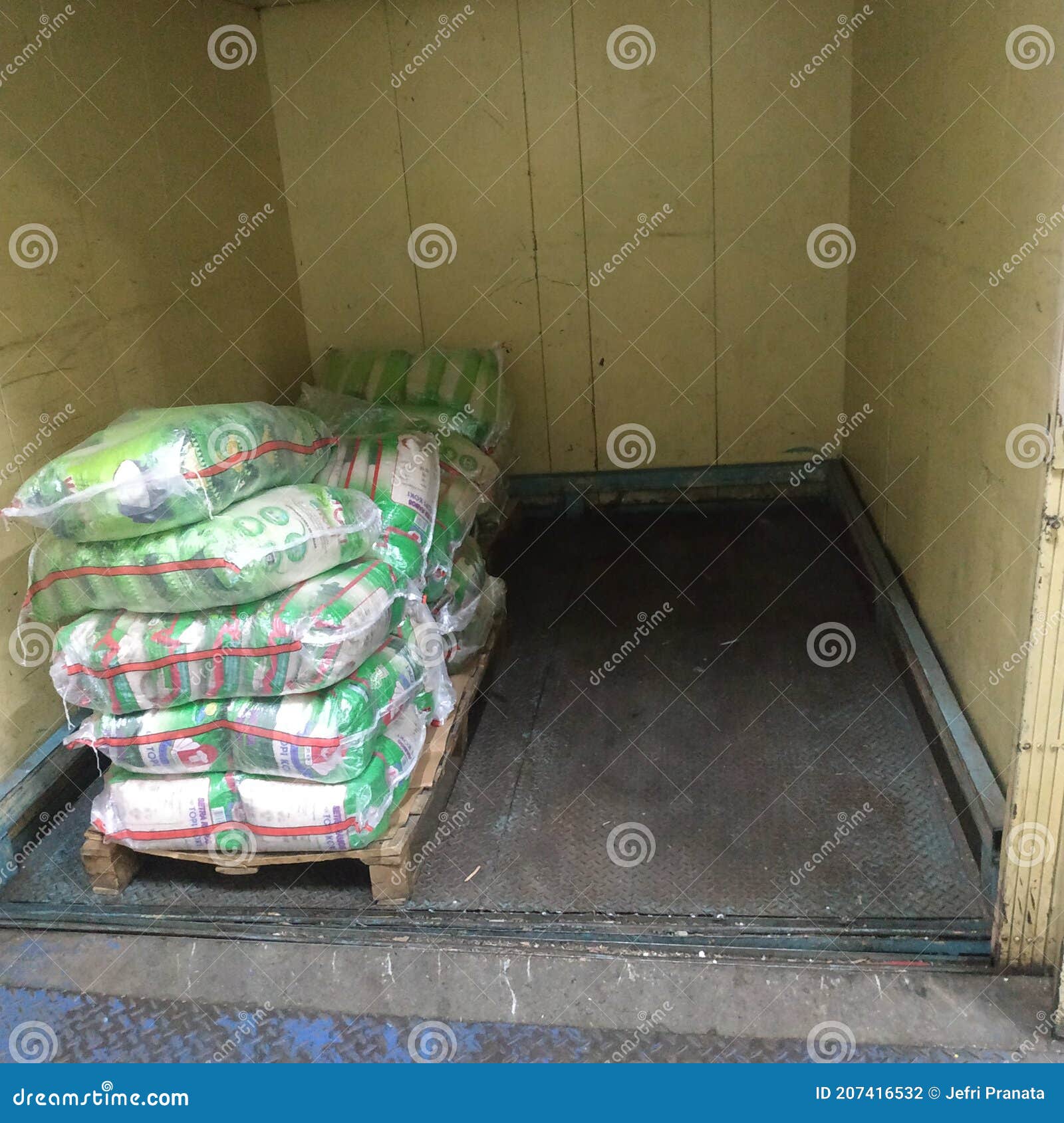 Rice Pack on Lift Pallet Yellow Stock Photo - Image of pack, yellow ...