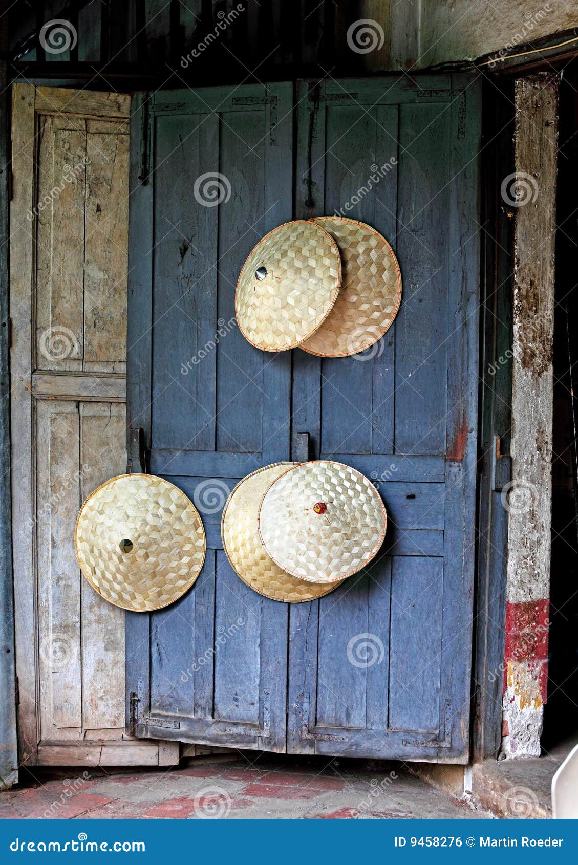 Rice Picker Hats on Blue Door Stock Photo - Image of traditional, asia ...