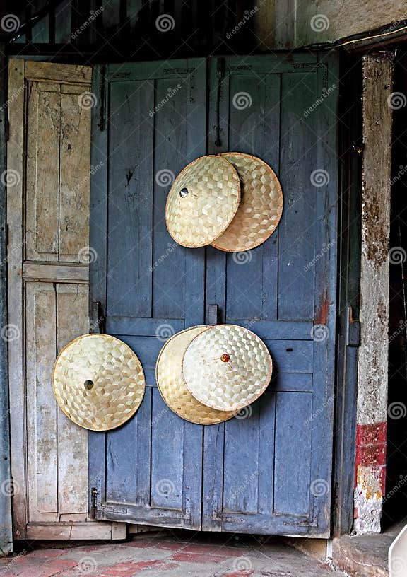 Rice Picker Hats on Blue Door Stock Photo - Image of traditional, asia ...
