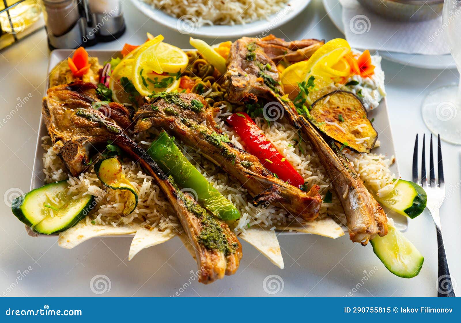 Rice Pilaf with Lamb Meat and Vegetables in Rectangular Bowl Stock ...