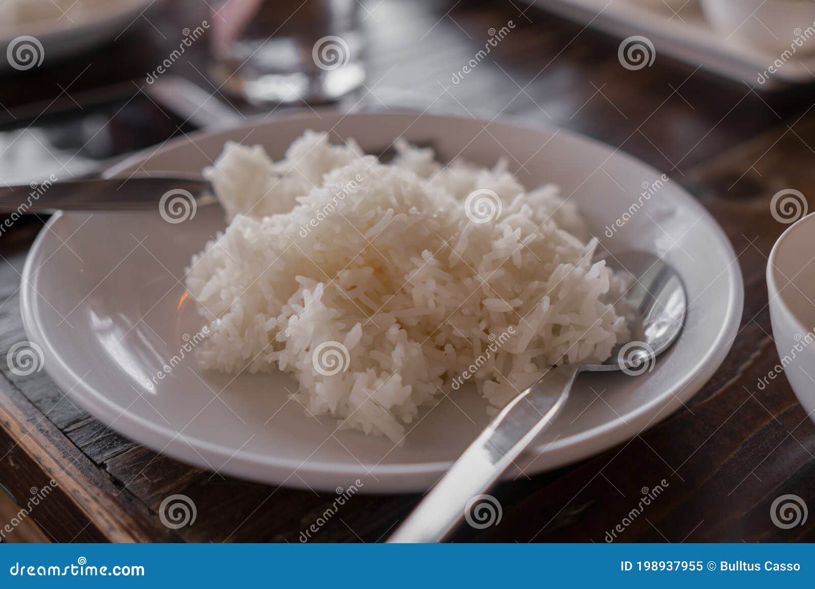 Rice in Plates and Utensils, Ready To Eat Stock Image - Image of fiber ...