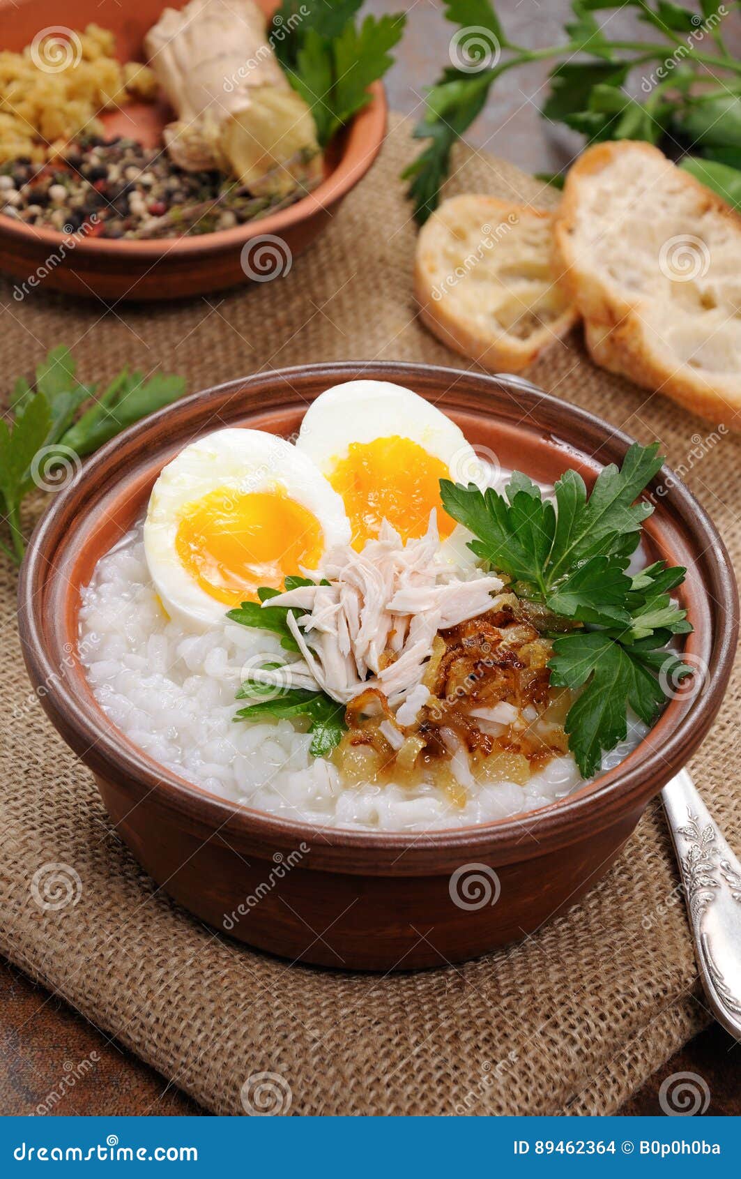 Rice porridge with egg stock photo. Image of lunch, herb - 89462364
