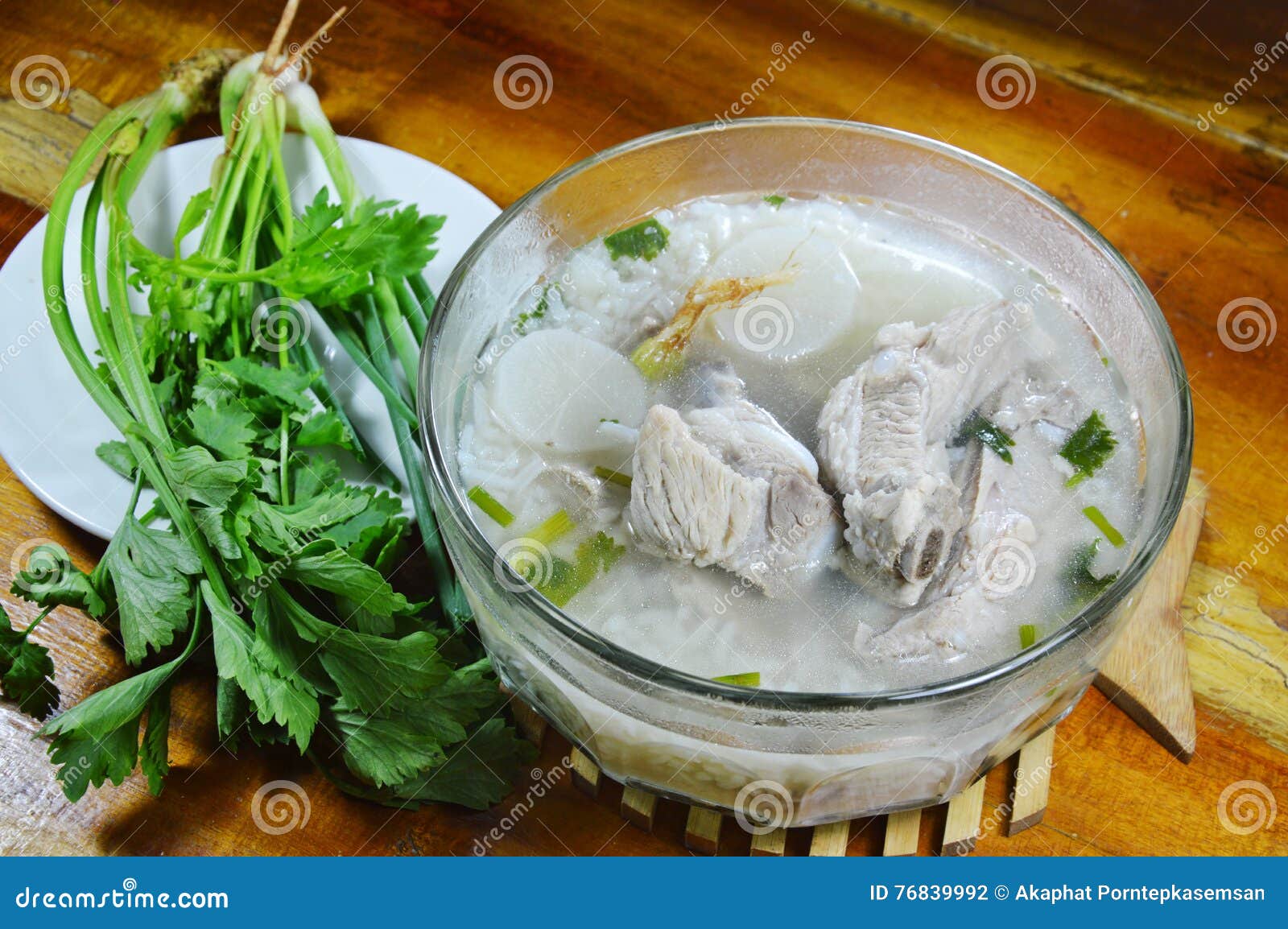 Rice Porridge with Pork Bone Hot Soup and Fresh Vegetable Stock Photo ...