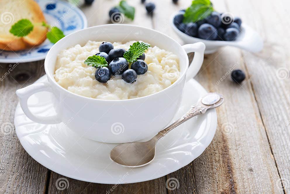 Rice Pudding with Blueberry Decorated with Mint Leaf Stock Photo ...