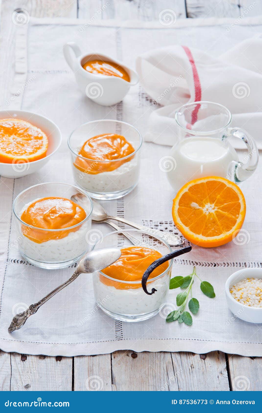Rice Pudding with Orange Custard Stock Image - Image of rustic ...