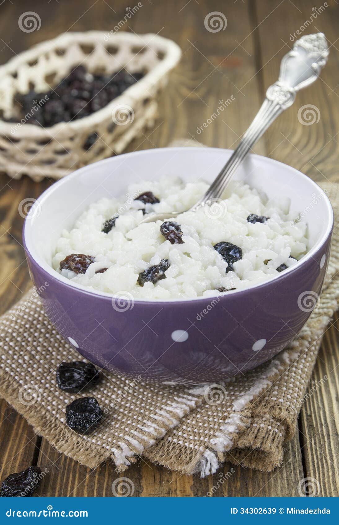 Rice pudding with raisins stock image. Image of eating - 34302639