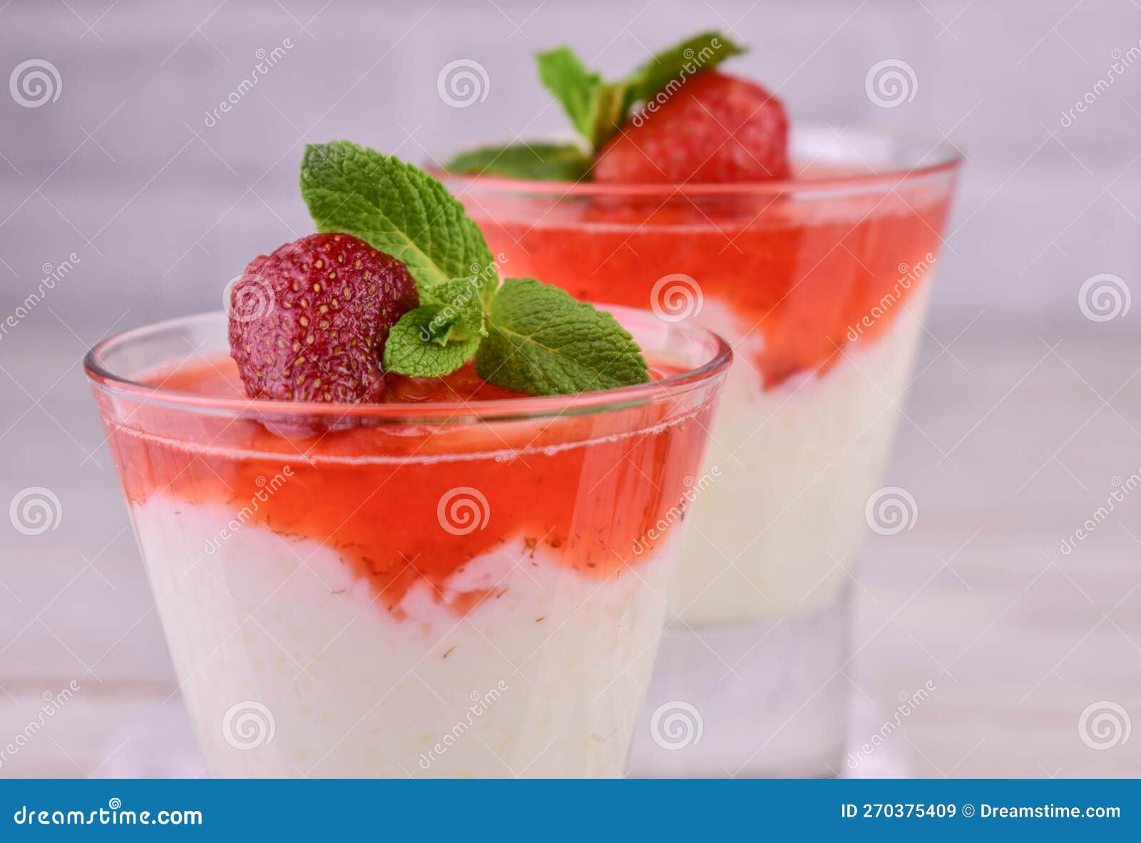 Rice Pudding with Strawberry Jam on a White Background.Close-up. Stock ...