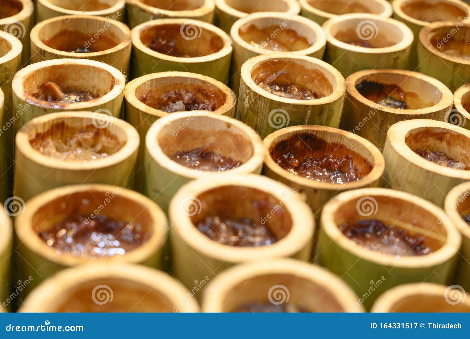 Rice roasted in bamboo stock image. Image of cooking - 164331517