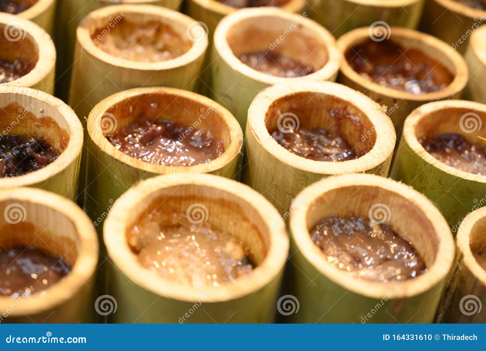 Rice roasted in bamboo stock photo. Image of glutinous - 164331610