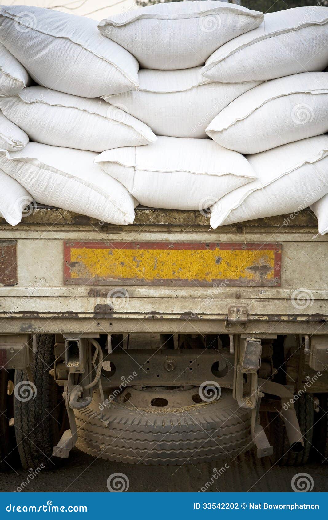 Sacks Of Rice Are Placed In Straight Rows On Wooden Pallets Royalty ...
