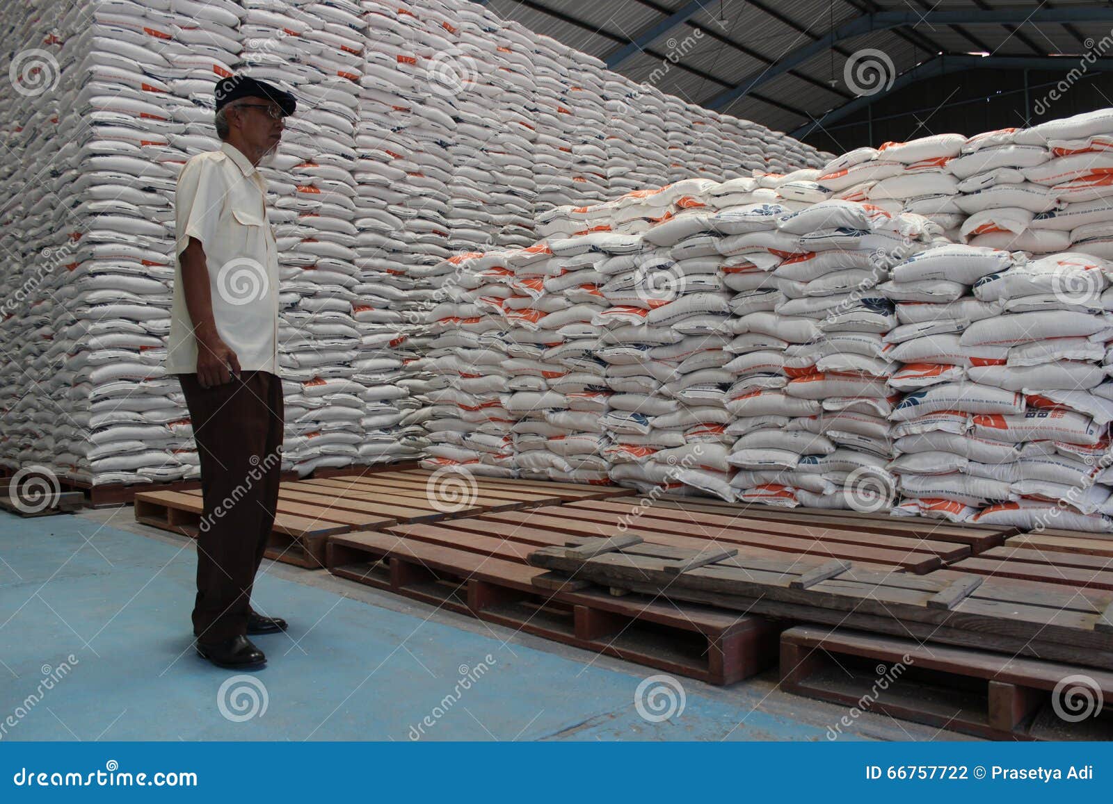 Rice storage warehouses editorial photography. Image of community ...