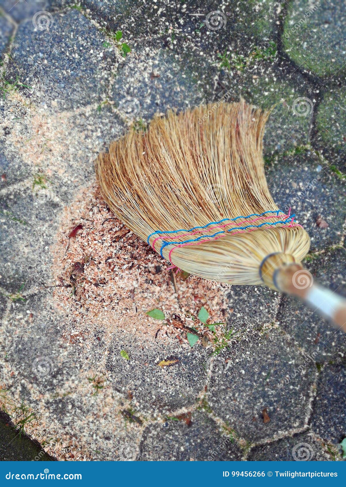 Rice straw broom in action stock photo. Image of shavings - 99456266