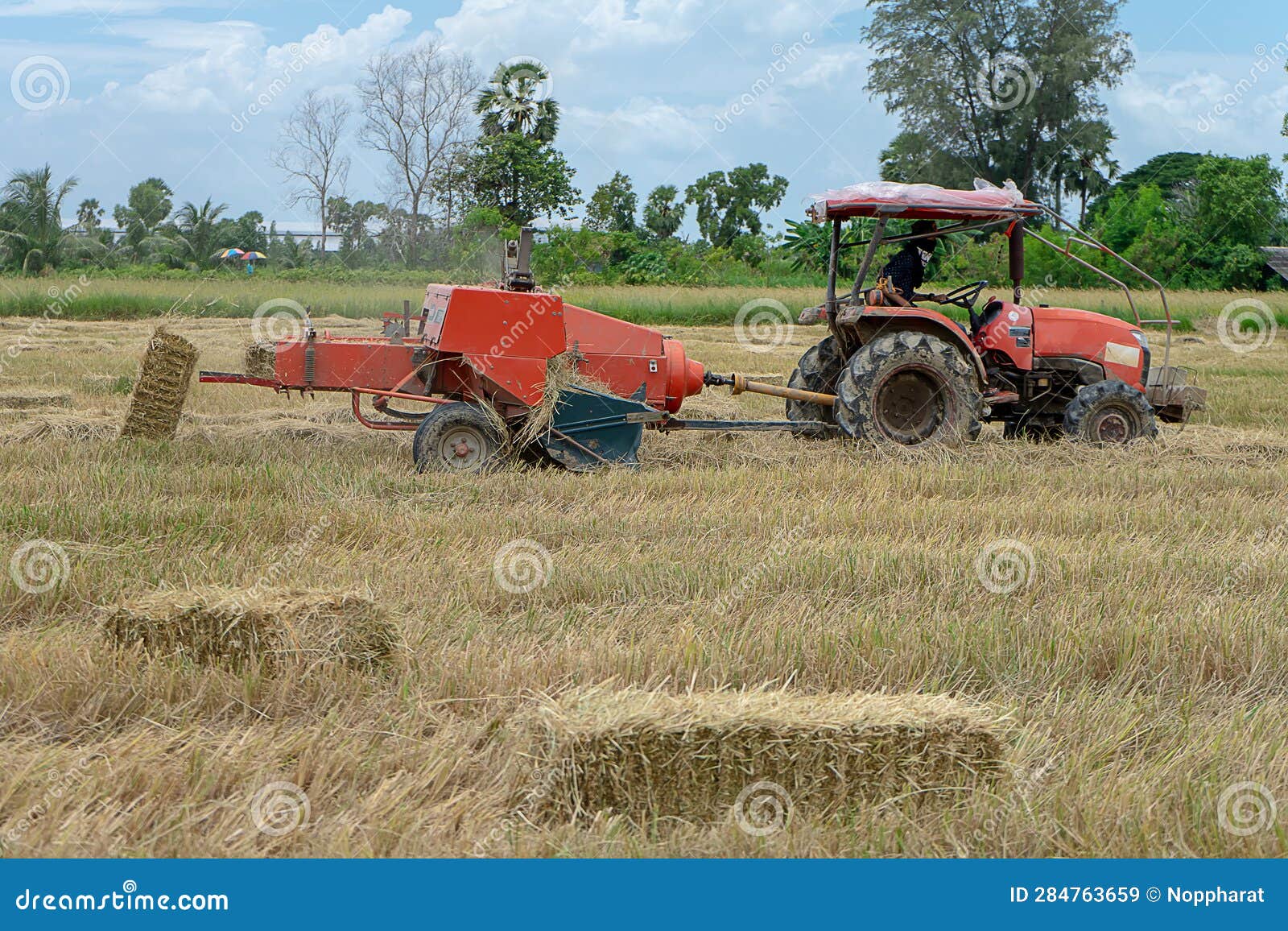 Rice straw machine stock image. Image of farmland, organic - 284763659