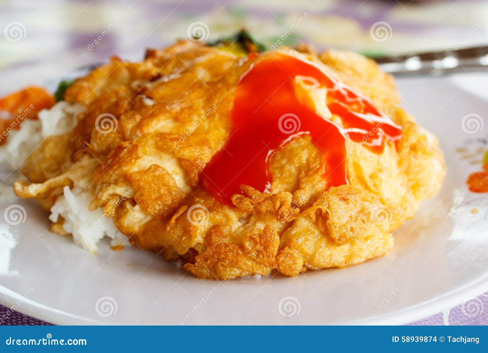 Rice topped with omelette. stock photo. Image of popular - 58939874