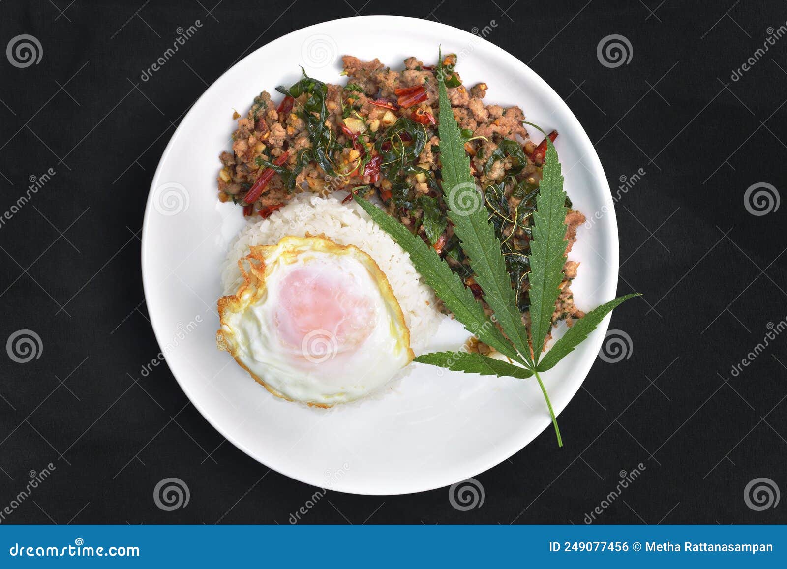 Rice and Topped with Stir - Fried Beef and Basil with Cannabis Leaf ...