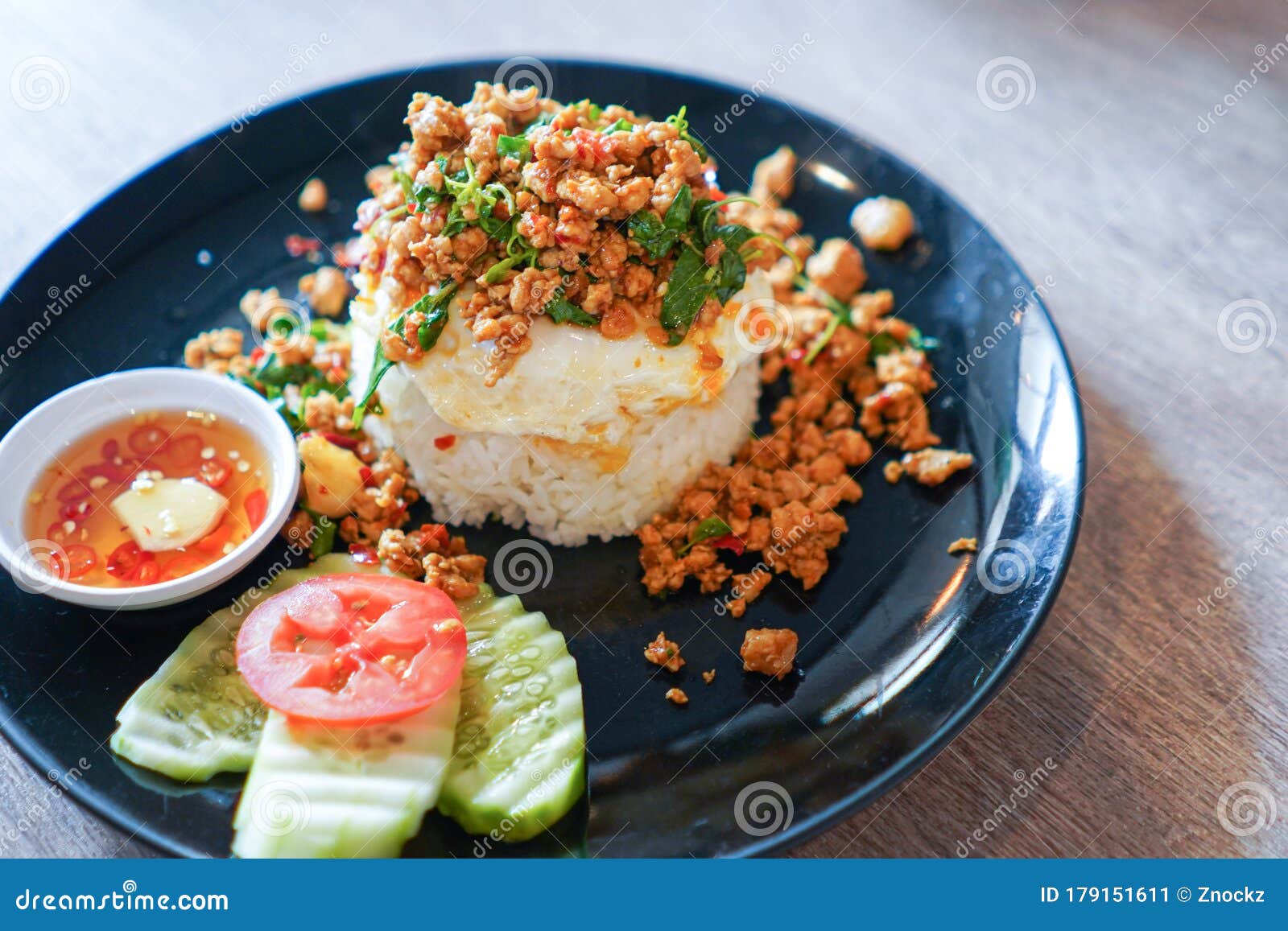 Rice Topped with Stir-fried Minced Pork and Basil with Fried Egg Stock ...