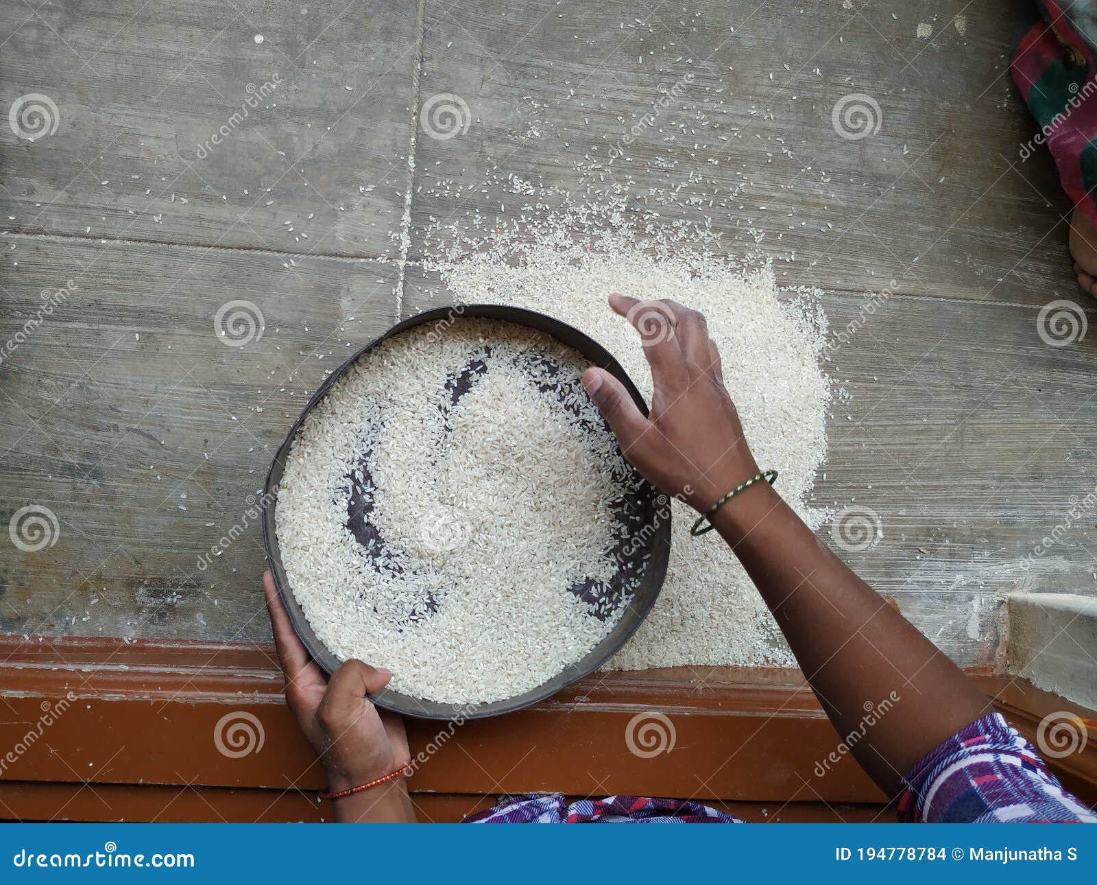 Rice in a Traditional Way by Using Big Iron Sieve Stock Photo - Image ...