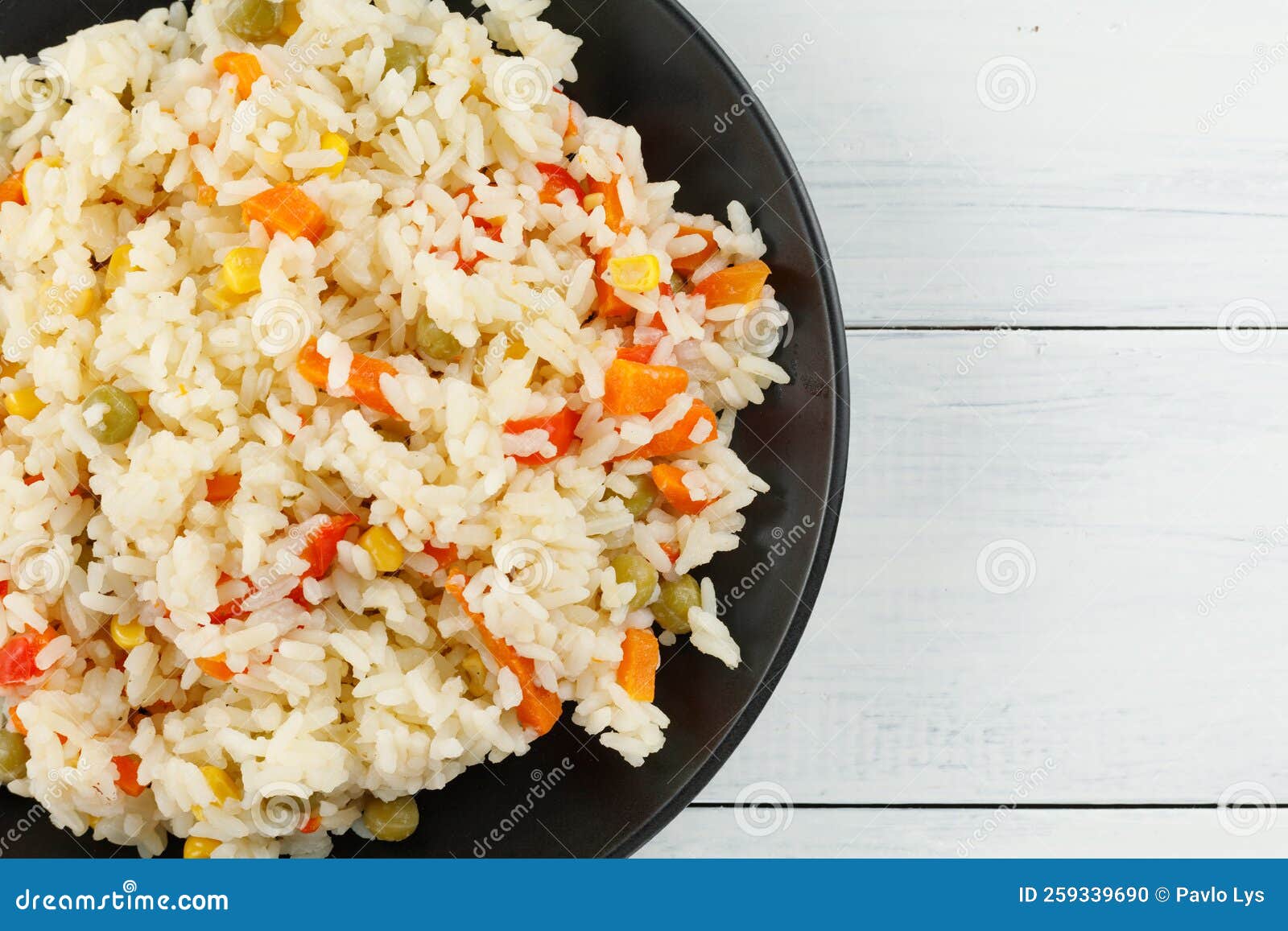 Rice with Vegetables in a Plate on the Table. Place for Text Cope Stock ...