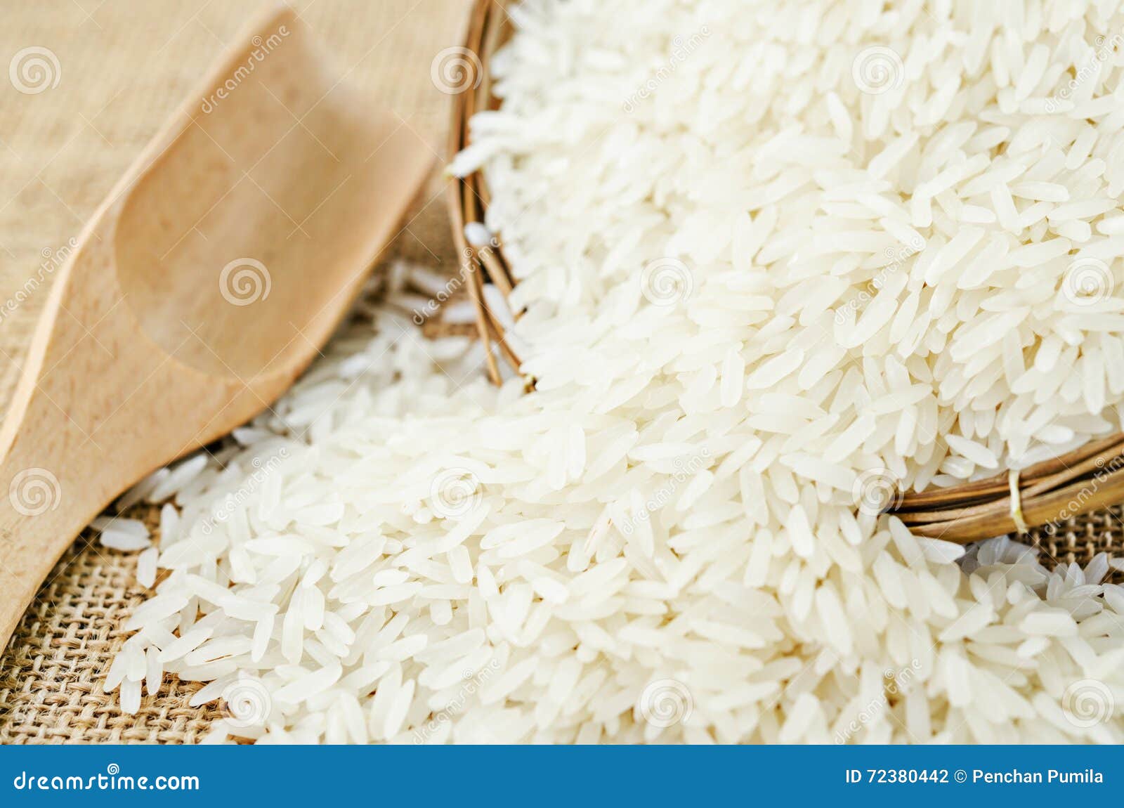 Rice in weave basket. stock photo. Image of scattered - 72380442