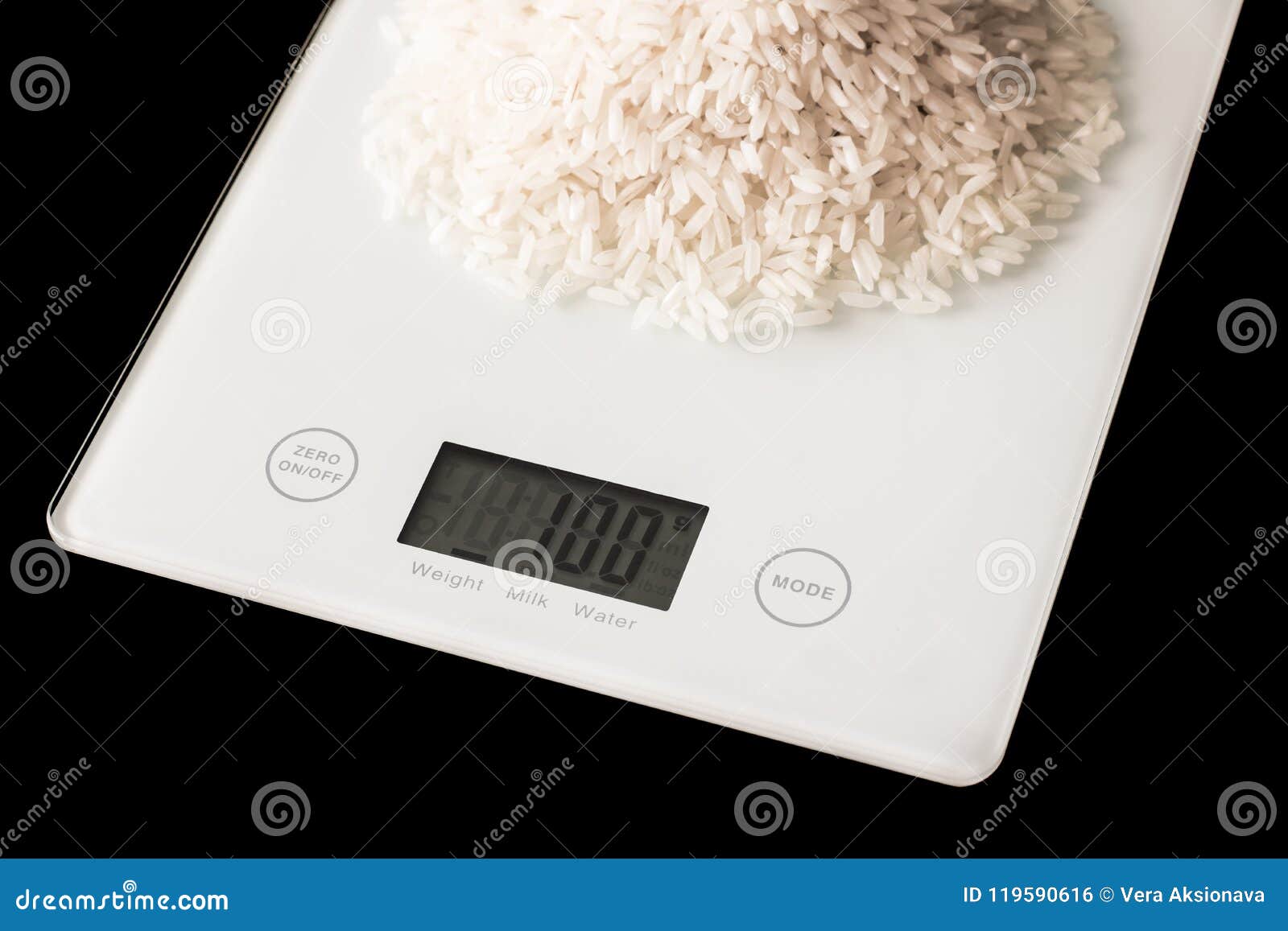 Rice on White Kitchen Scales on a Black Background Stock Photo - Image ...