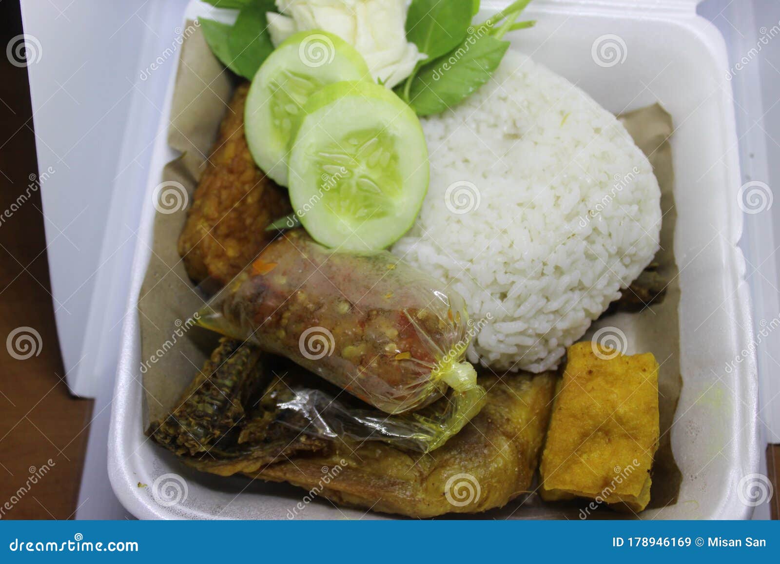 Rice Wrapped with Tofu, Tempe and Fried Chicken for Lunch Stock Image ...