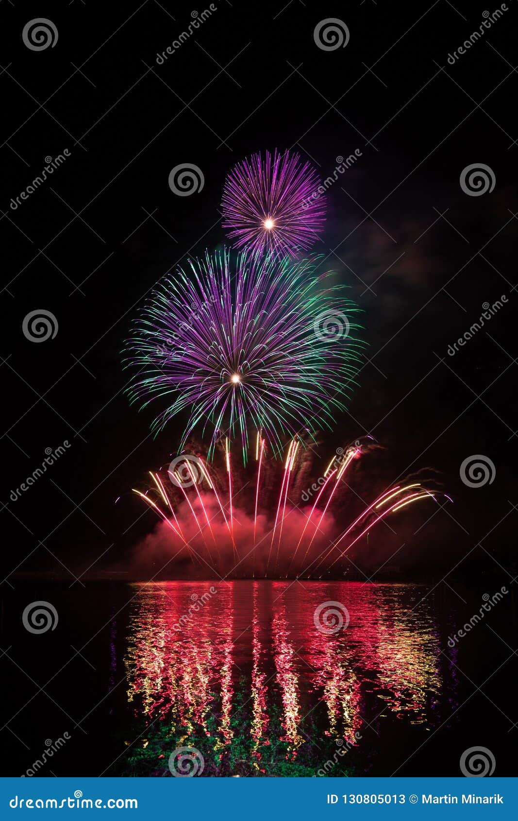 Rich and Colorful Fireworks Over Surface of Brno`s Dam with Reflection ...