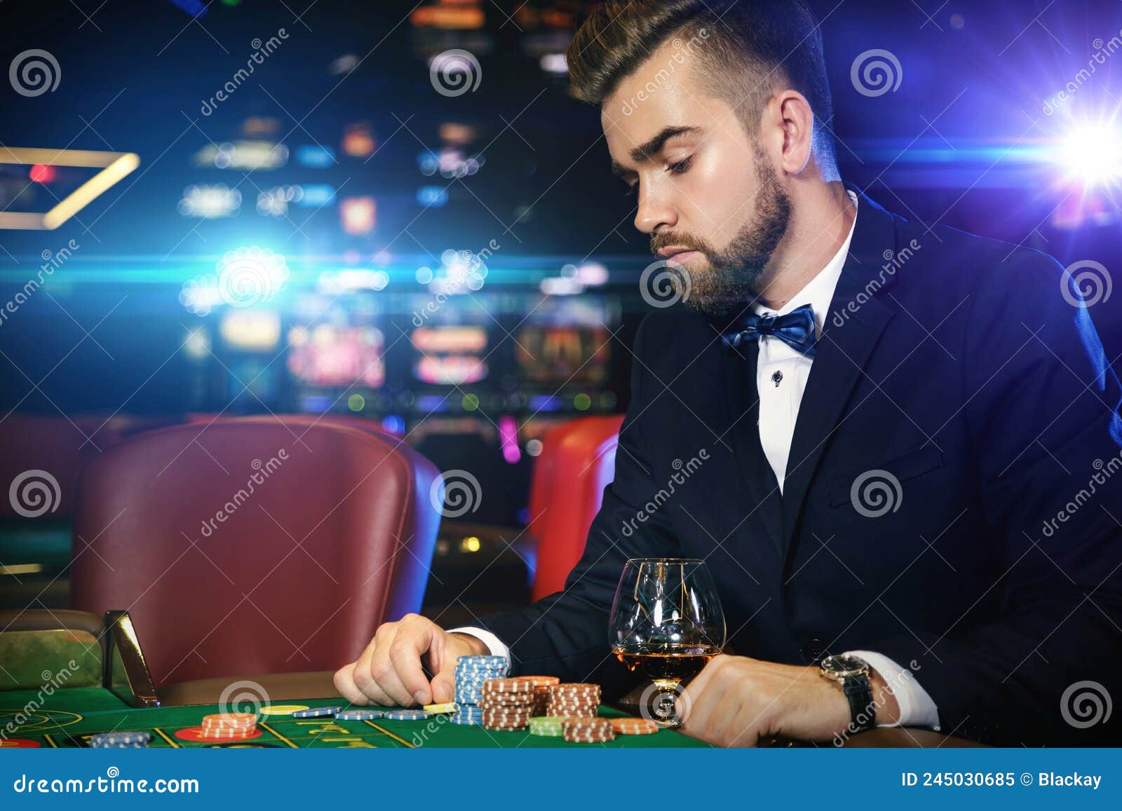 Handsome Man Playing Roulette in the Casino Stock Image - Image of ...